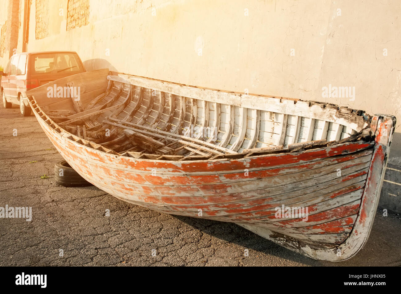 Boat old broken, stands on the pier waiting for repair in Sunny weather ...