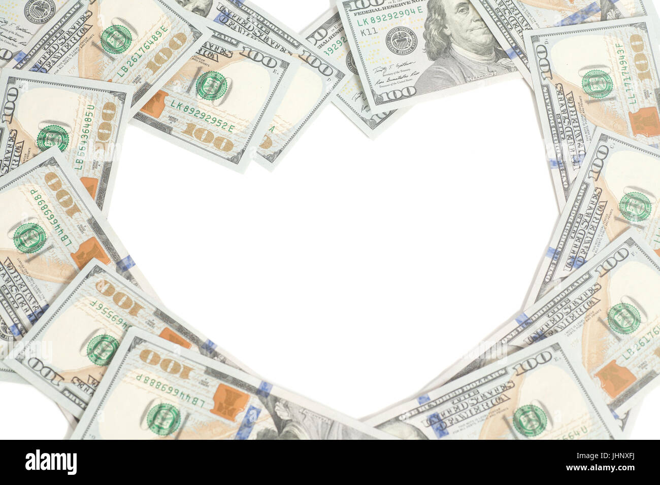 Dollar US bills in heart shape Stock Photo - Alamy