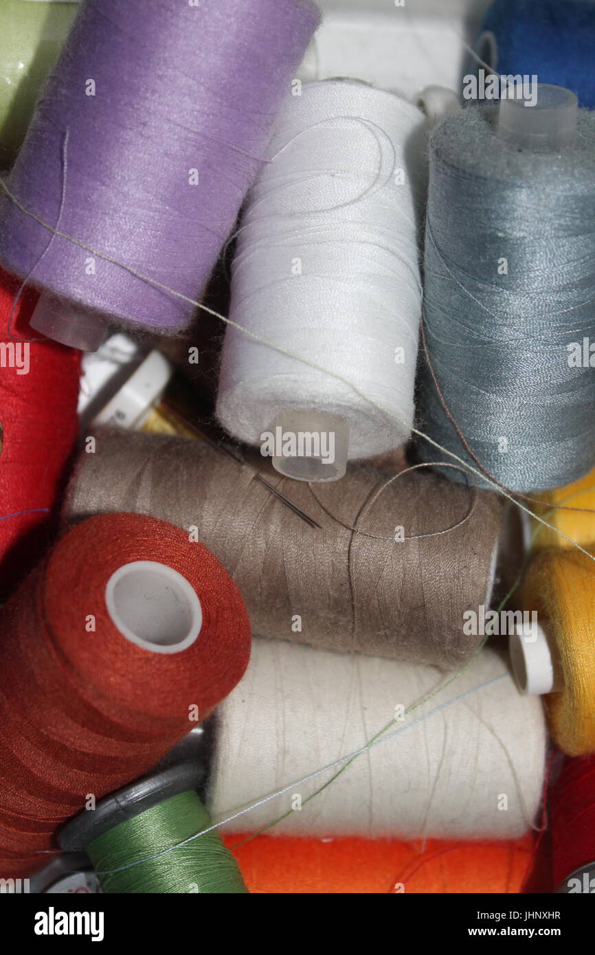 Pile of different sowing threads Stock Photo - Alamy
