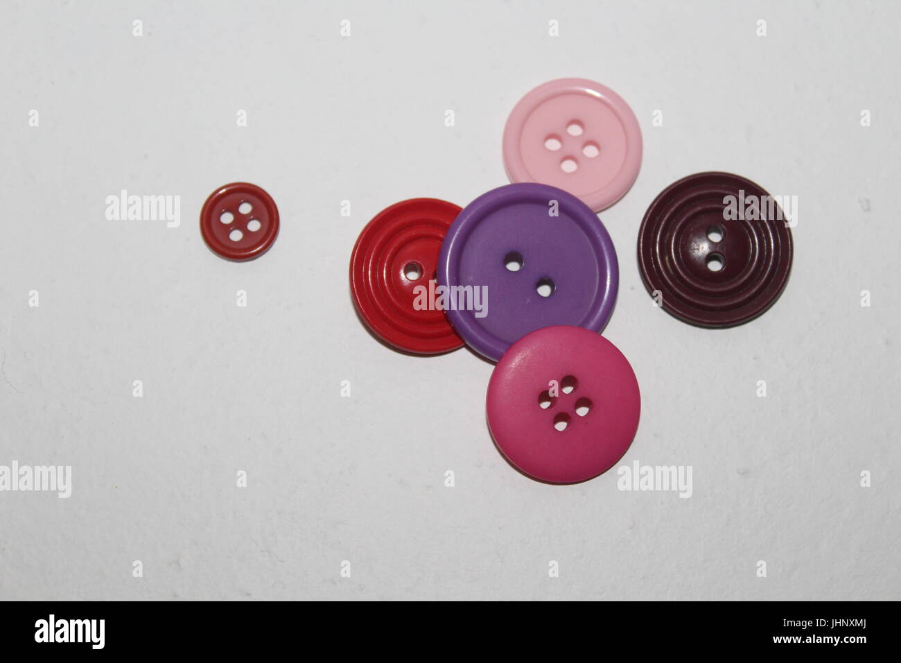 Buttons on white background Stock Photo - Alamy