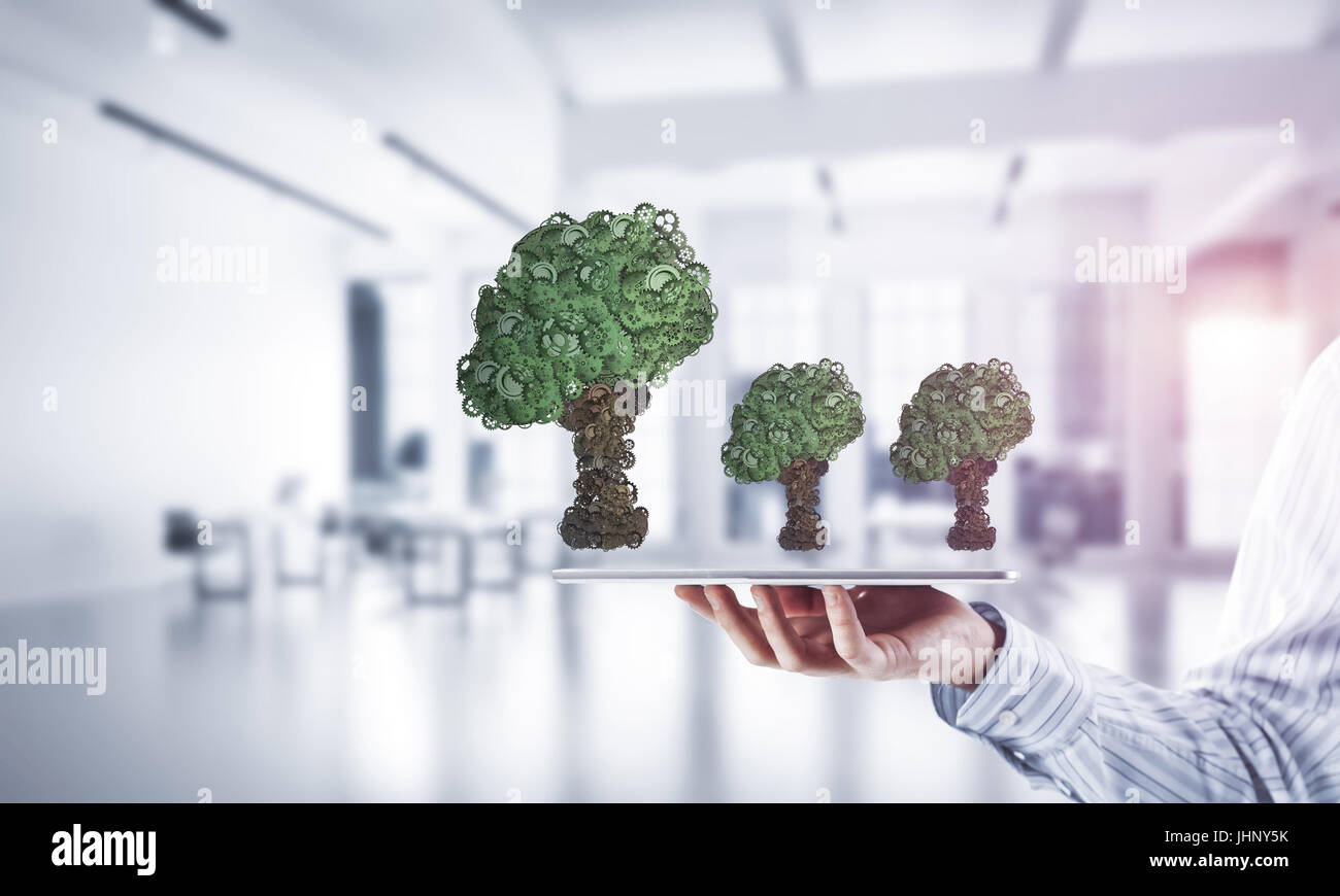 Eco green environment concept presented by tree as working mecha Stock ...