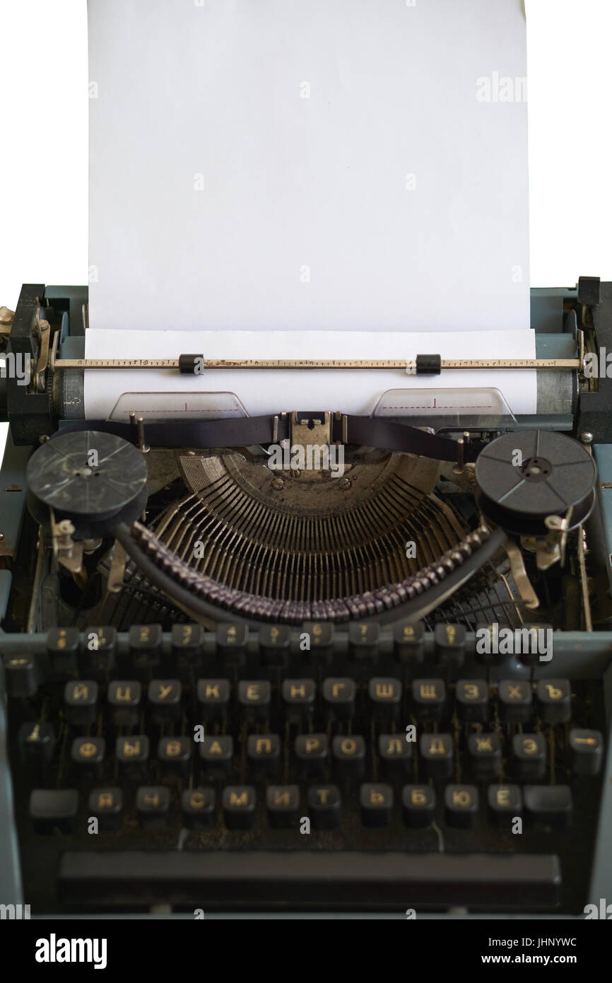 obsolete antique russian typewriter with cyrillic symbols and inserted ...
