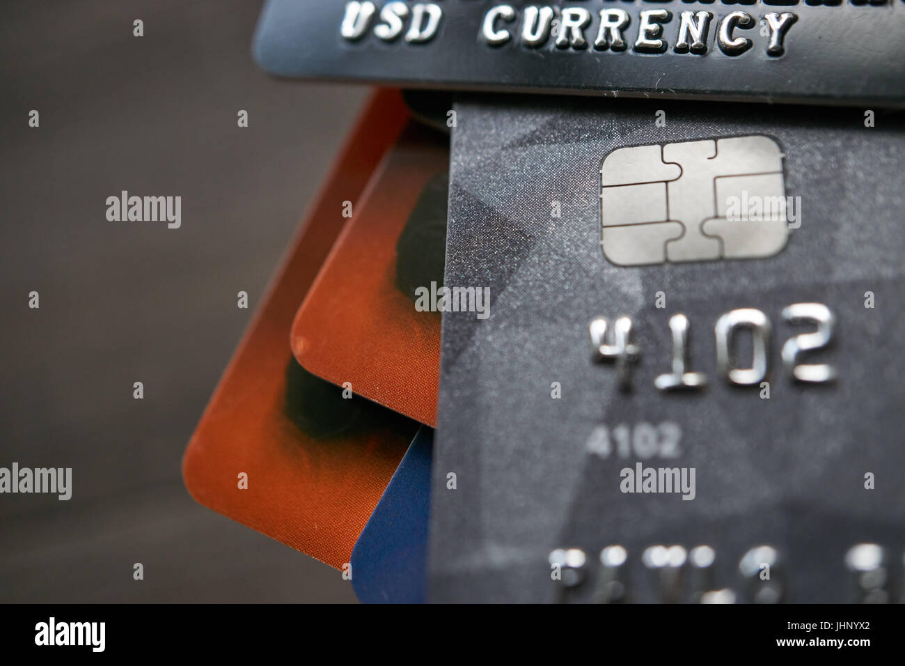 stack pile of bank payment credit cards with micro chip us dollars ...