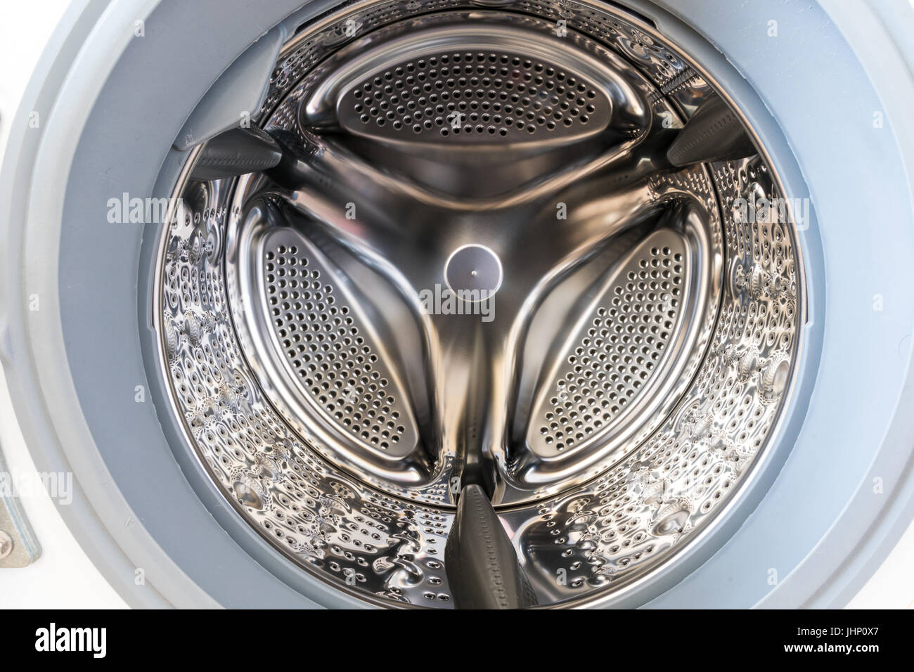 Close up view of the inside of a washing machine drum Stock Photo - Alamy