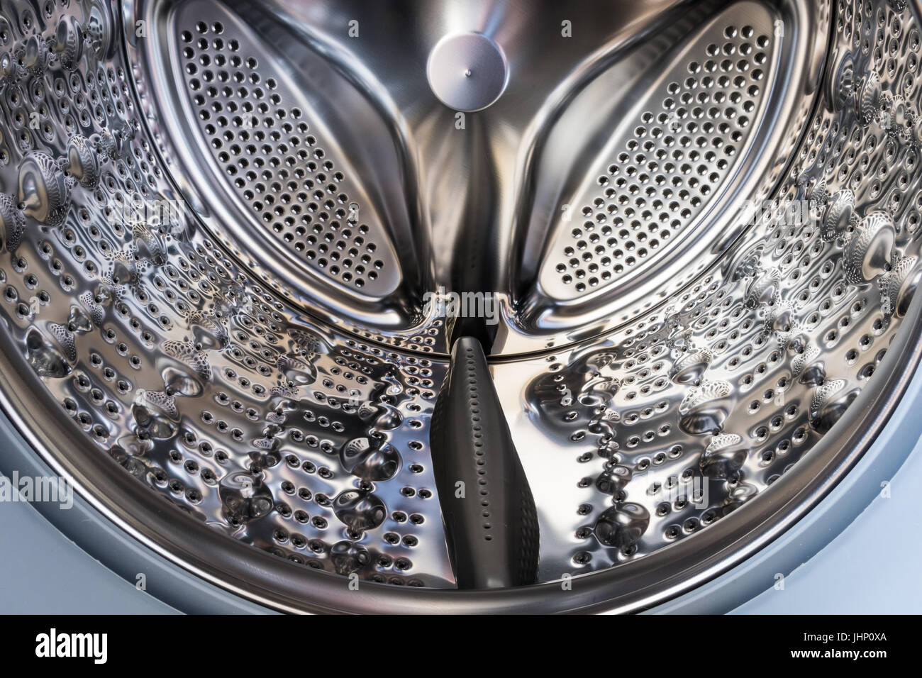 Close up view of the inside of a washing machine drum Stock Photo - Alamy