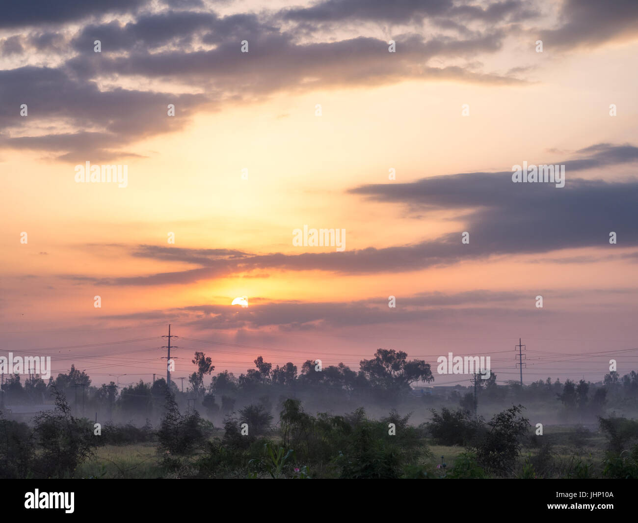 View of dramatic moving clouds in nature landscape during sunrise Stock ...