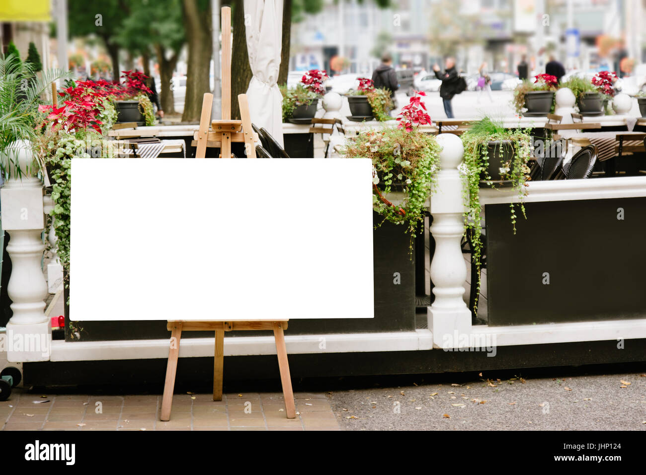 Blank Board menu, stand mock up, on the terrace of the restaurant ...