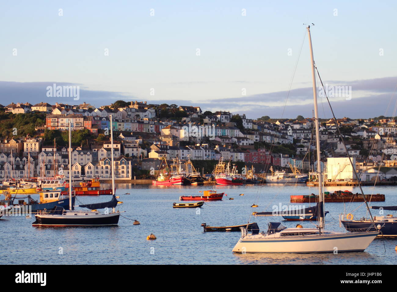 Brixham harbour at sunrise Stock Photo - Alamy