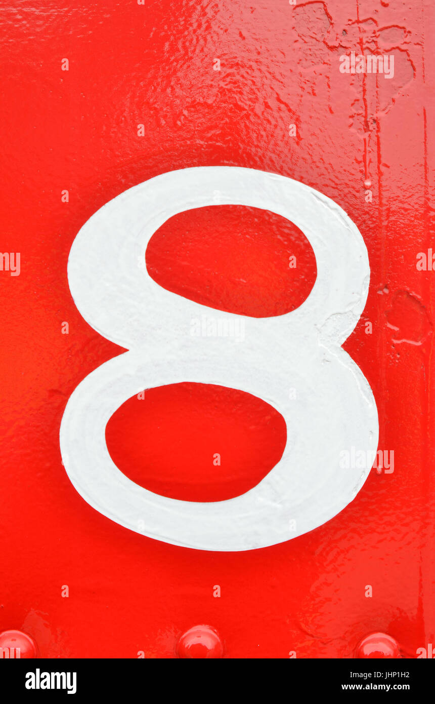 vintage hand painted mid-century numbers on red Stock Photo - Alamy