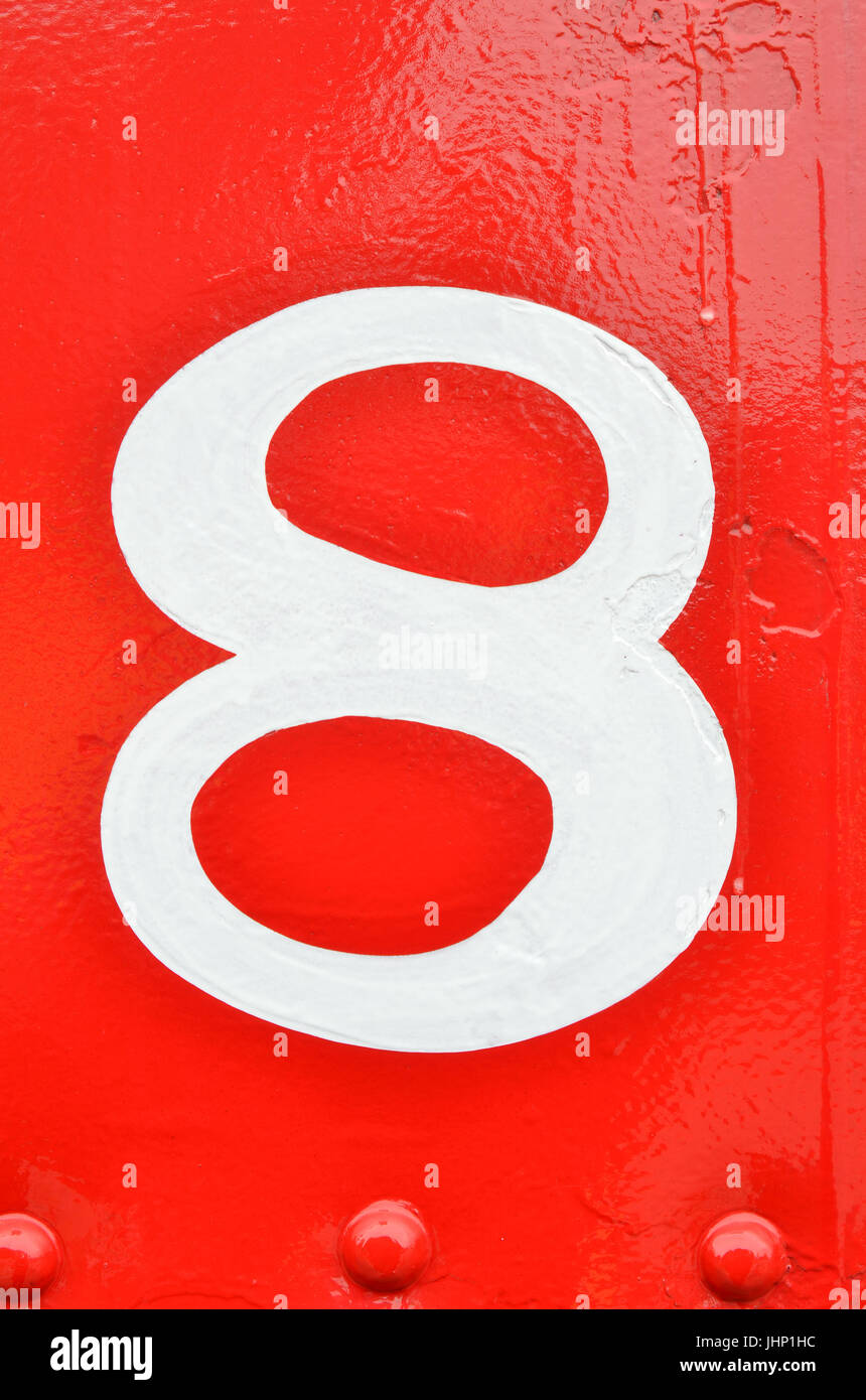 vintage hand painted mid-century numbers on red Stock Photo - Alamy