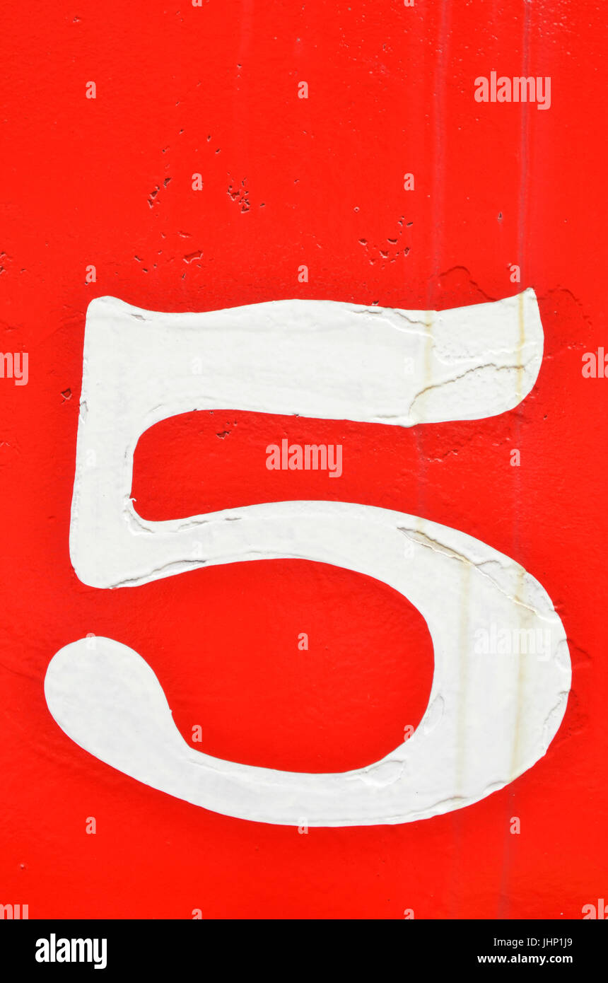 vintage hand painted mid-century numbers on red Stock Photo - Alamy