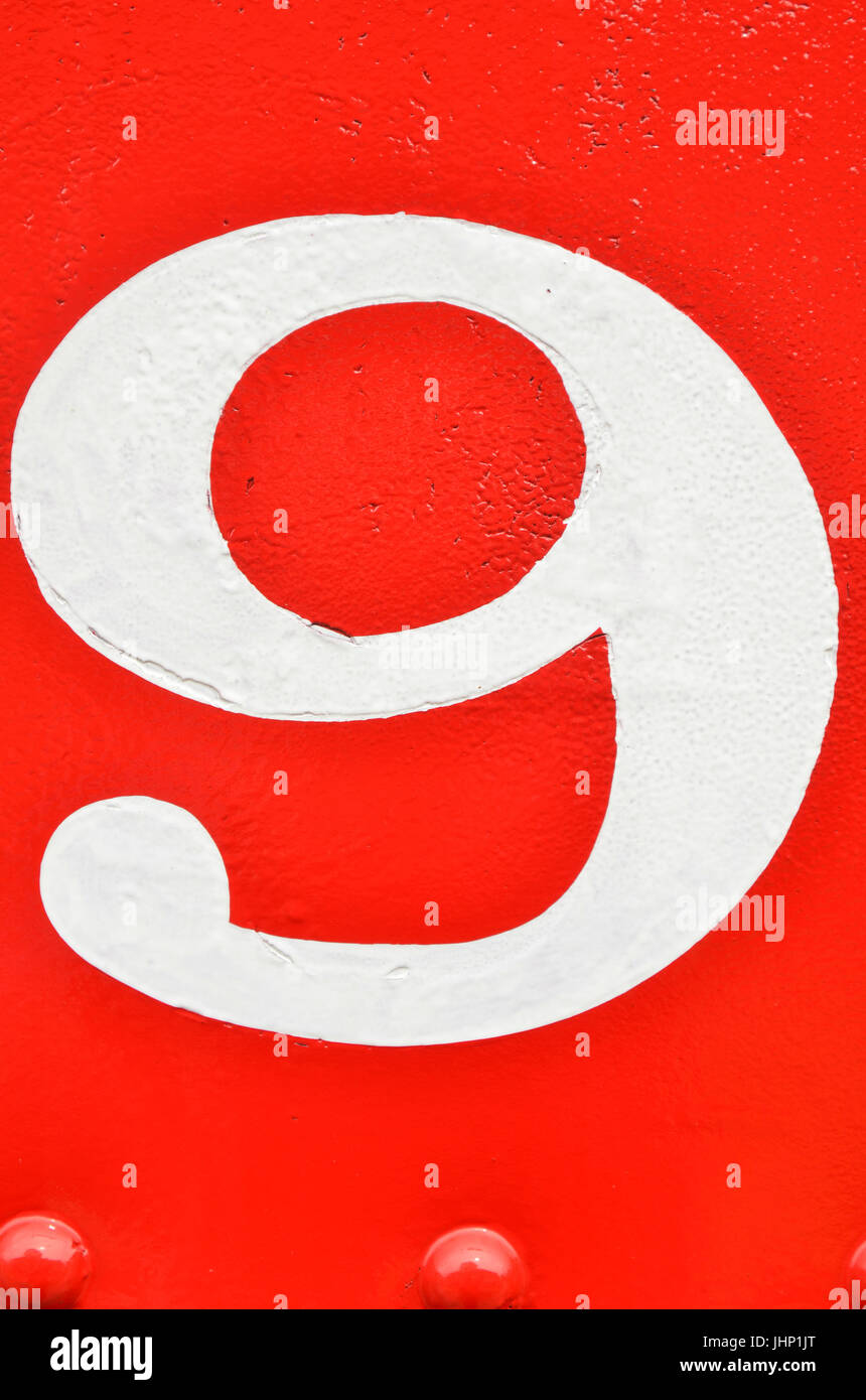 vintage hand painted mid-century numbers on red Stock Photo - Alamy