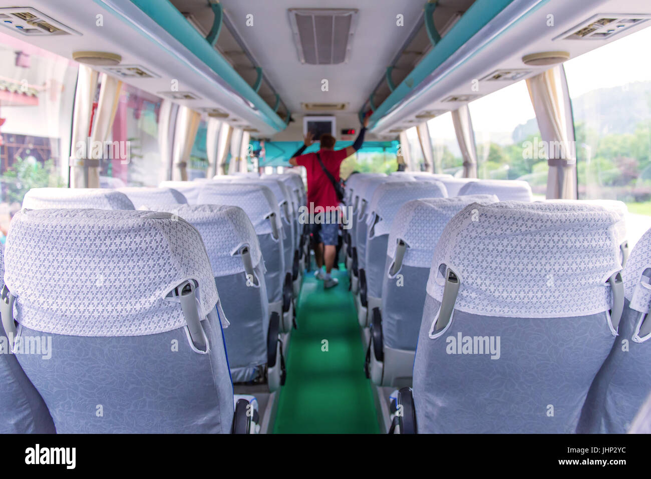 Seat places in back side of modern bus Stock Photo - Alamy