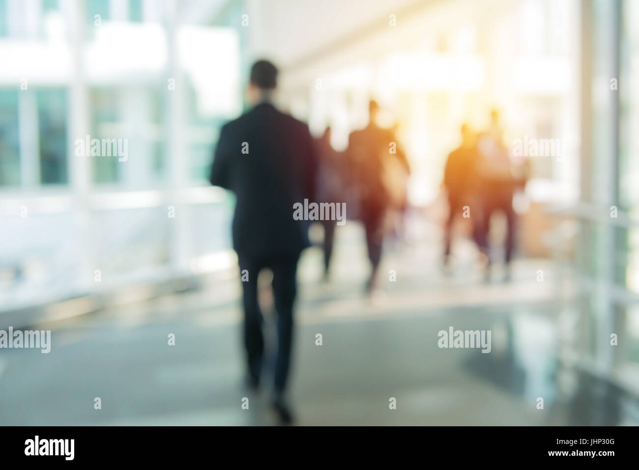 blur People Walking in the corridor of business center Stock Photo - Alamy