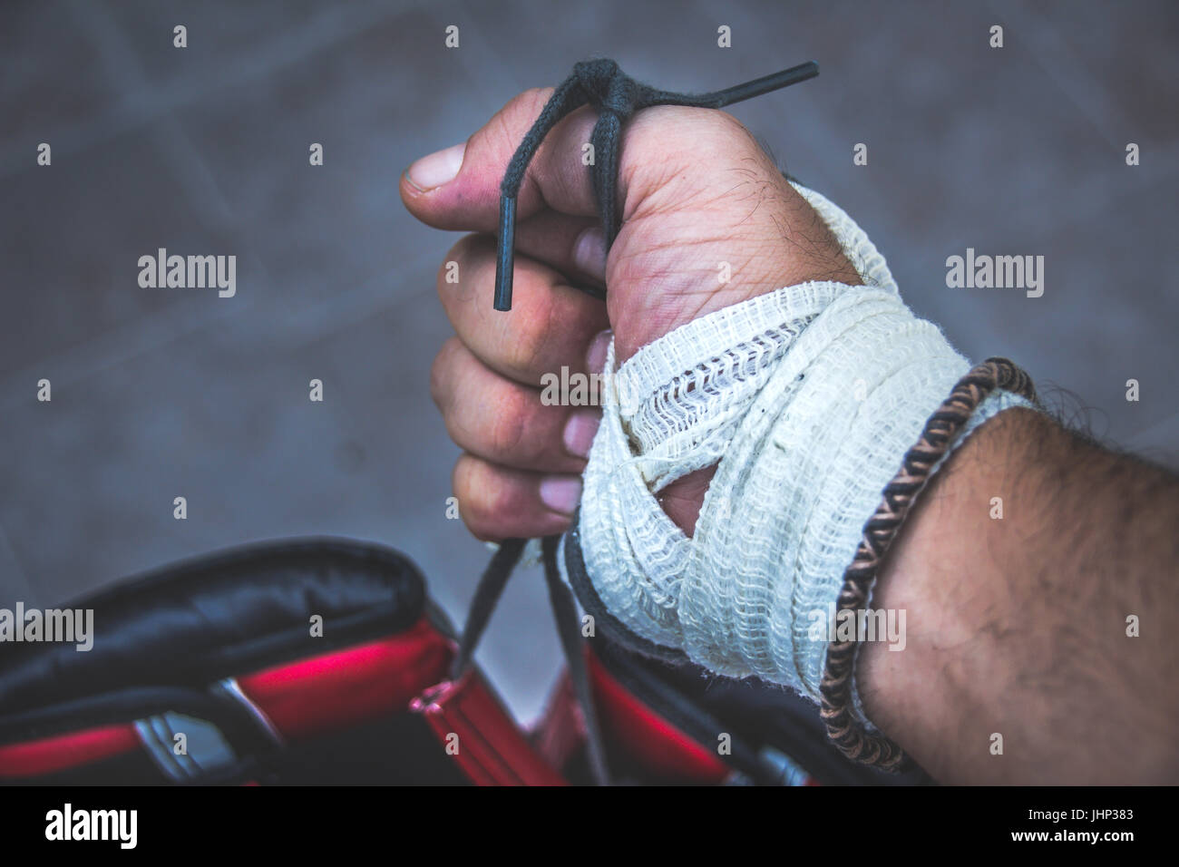 Photograph of a human fist and boxing gloves Stock Photo - Alamy