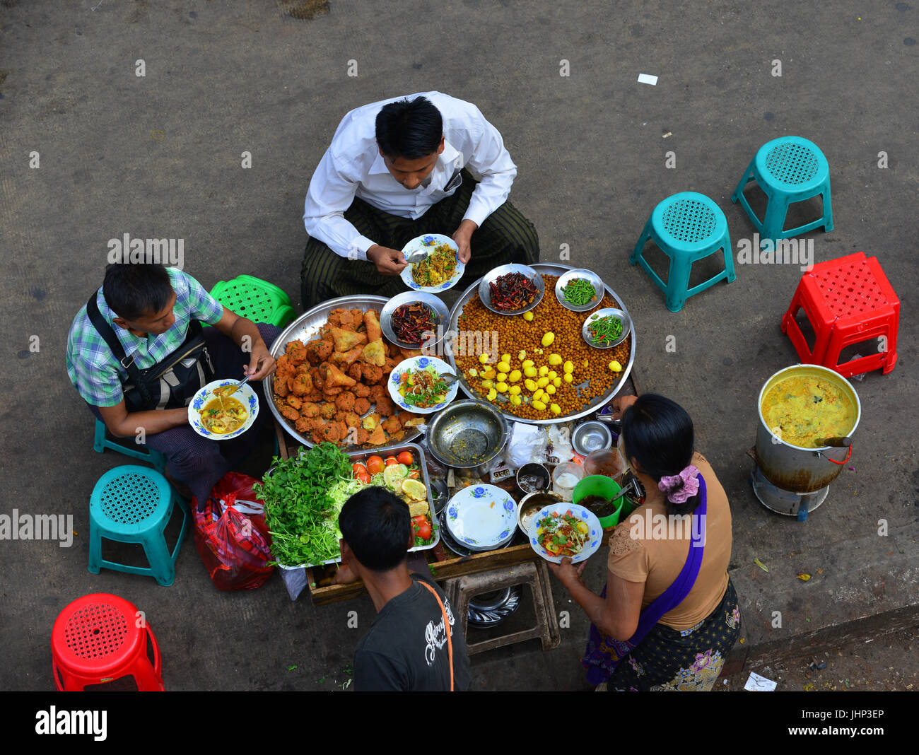 Yangon, Myanmar - Feb 1, 2017. Burmese people selling street food in ...
