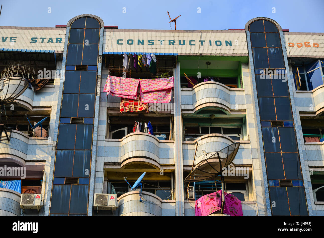 Yangon, Myanmar - Feb 1, 2017. Facade of apartment in Yangon, Myanmar ...