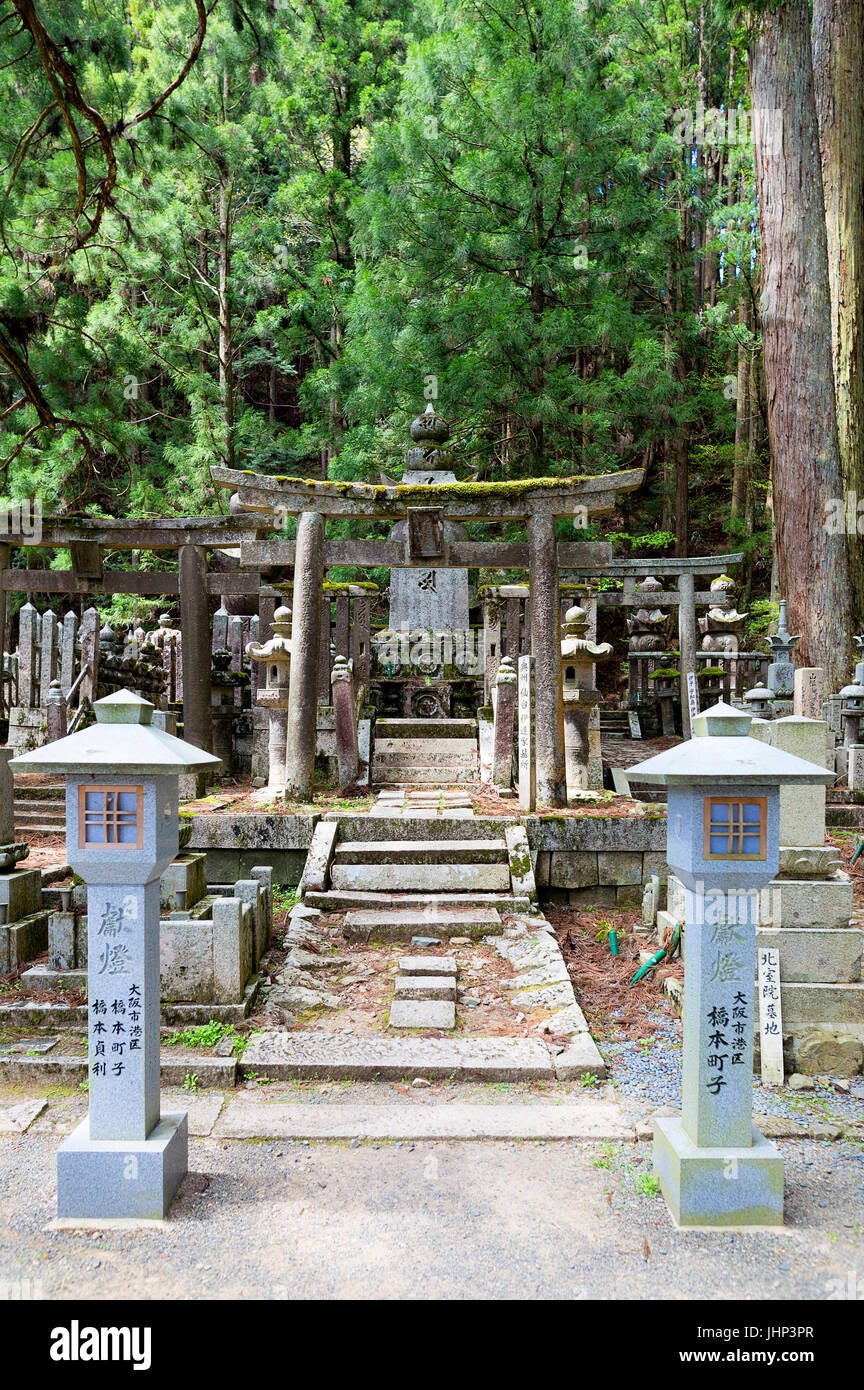 A memorial in Okunoin ancient Buddhist cemetery in Koyasan, Japan, Asia ...