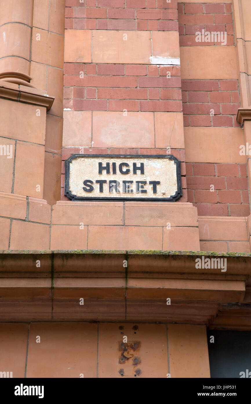 High Street Sign on Red Brick Wall Stock Photo - Alamy