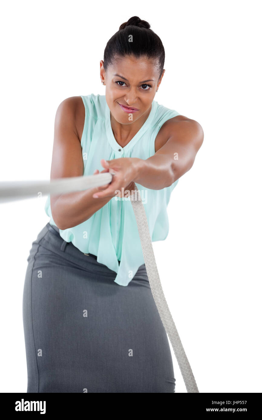 Businesswoman pulling the rope against white background Stock Photo - Alamy