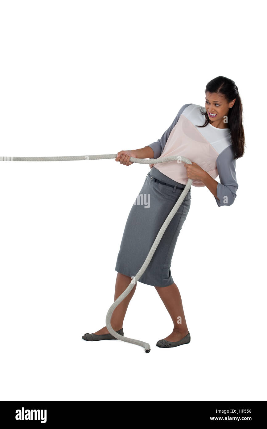 Businesswoman pulling the rope against white background Stock Photo - Alamy