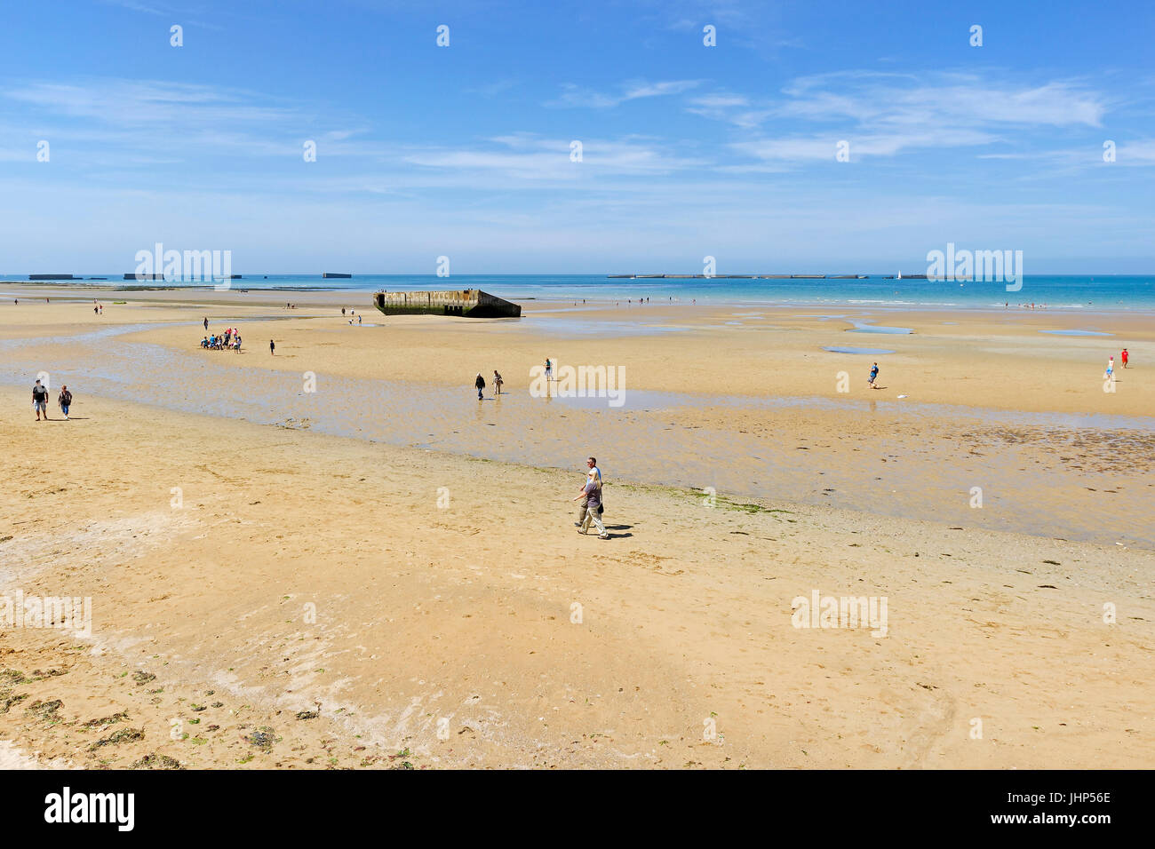 ARROMANCHES, FRANCE - JUNE 2014; Remains of the temporary harbor used ...