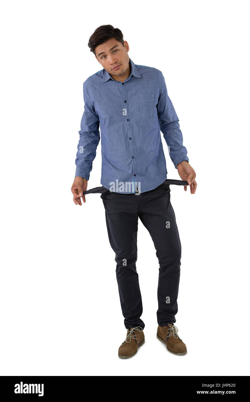 Full length portrait of businessman showing empty pockets Stock Photo ...