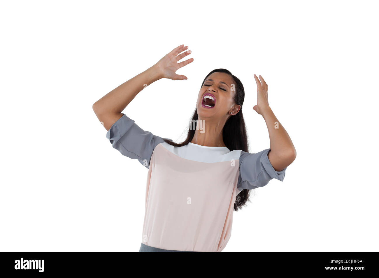 Frustrated businesswoman shouting against white background Stock Photo ...