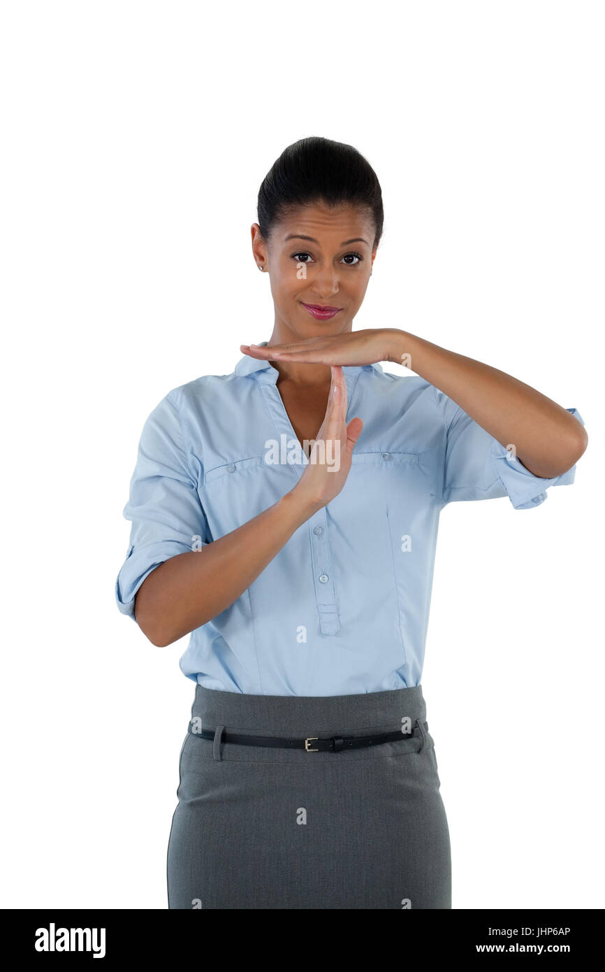 Portrait of businesswoman making a timeout hand gesture Stock Photo - Alamy