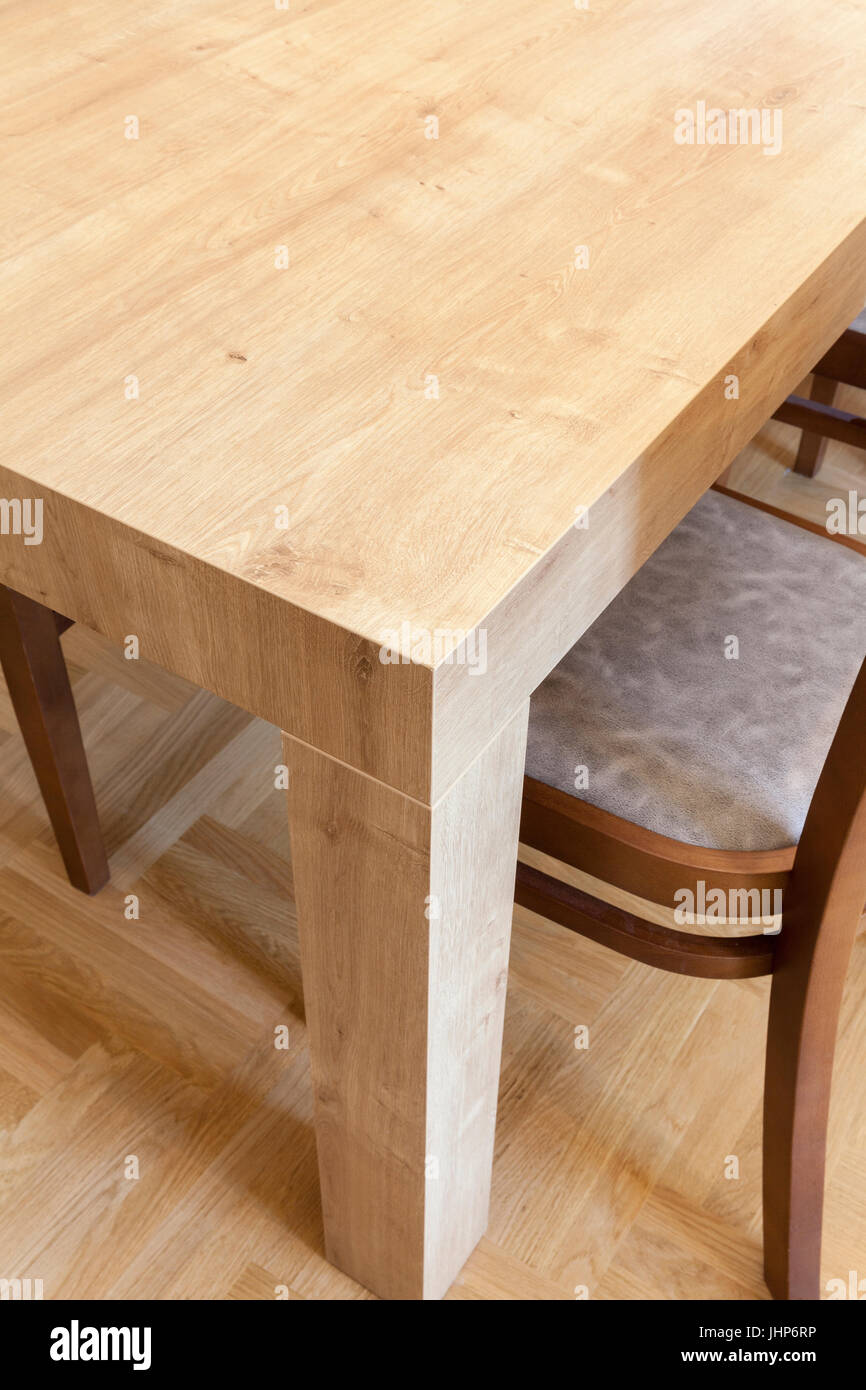 wooden table and chair, close up Stock Photo - Alamy