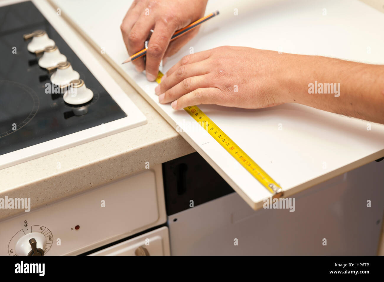 installation of kitchen parts, close up Stock Photo - Alamy