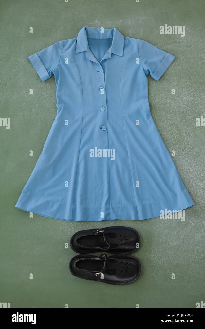 Close-up of school uniform arranged on chalkboard Stock Photo - Alamy