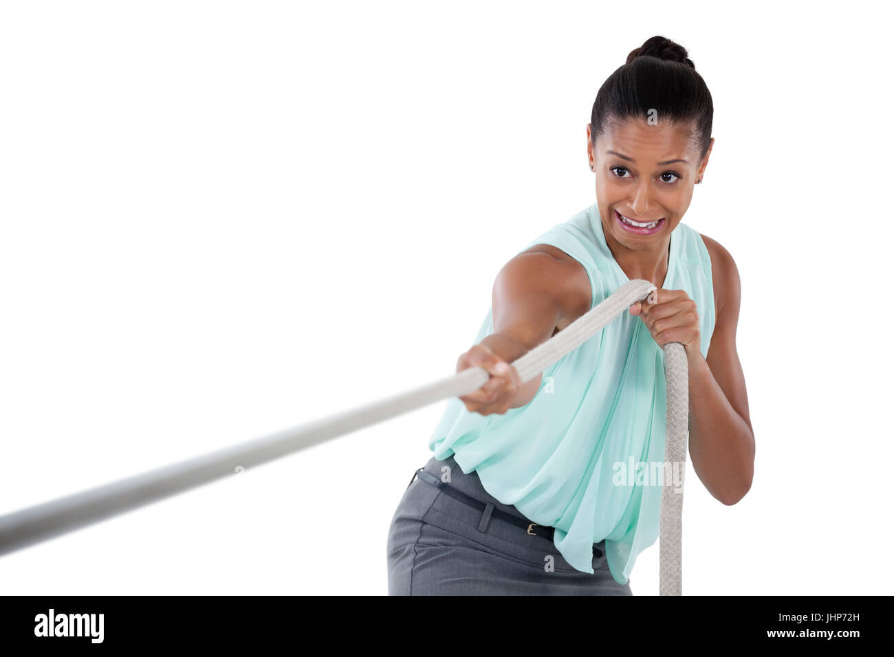 Businesswoman pulling the rope against white background Stock Photo - Alamy