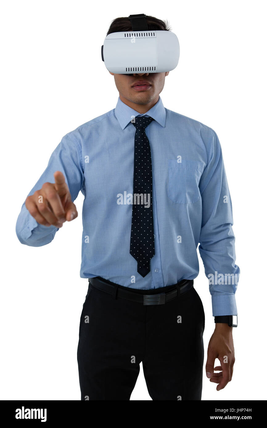 Businessman using invisible interface while wearing vr glasses against ...