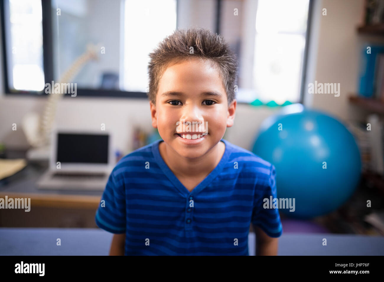 Portrait of smiling boy at hospital ward Stock Photo - Alamy
