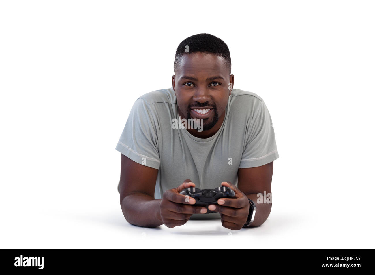 Close-up of man playing video game against white background Stock Photo ...