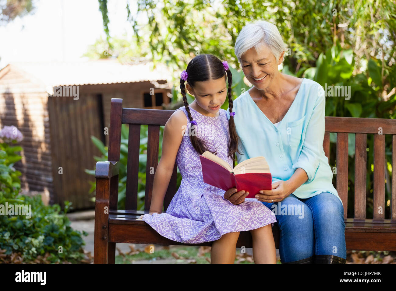 Grandmother reading book hi-res stock photography and images - Alamy