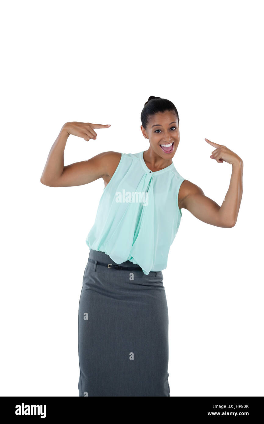 Happy woman pointing at herself against white background Stock Photo ...