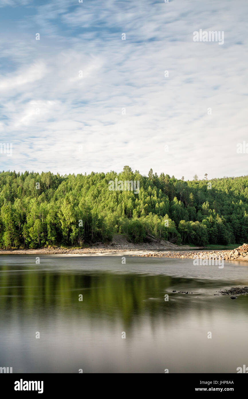 Ljungan River in Sweden with forest and a cloudy sky Stock Photo - Alamy