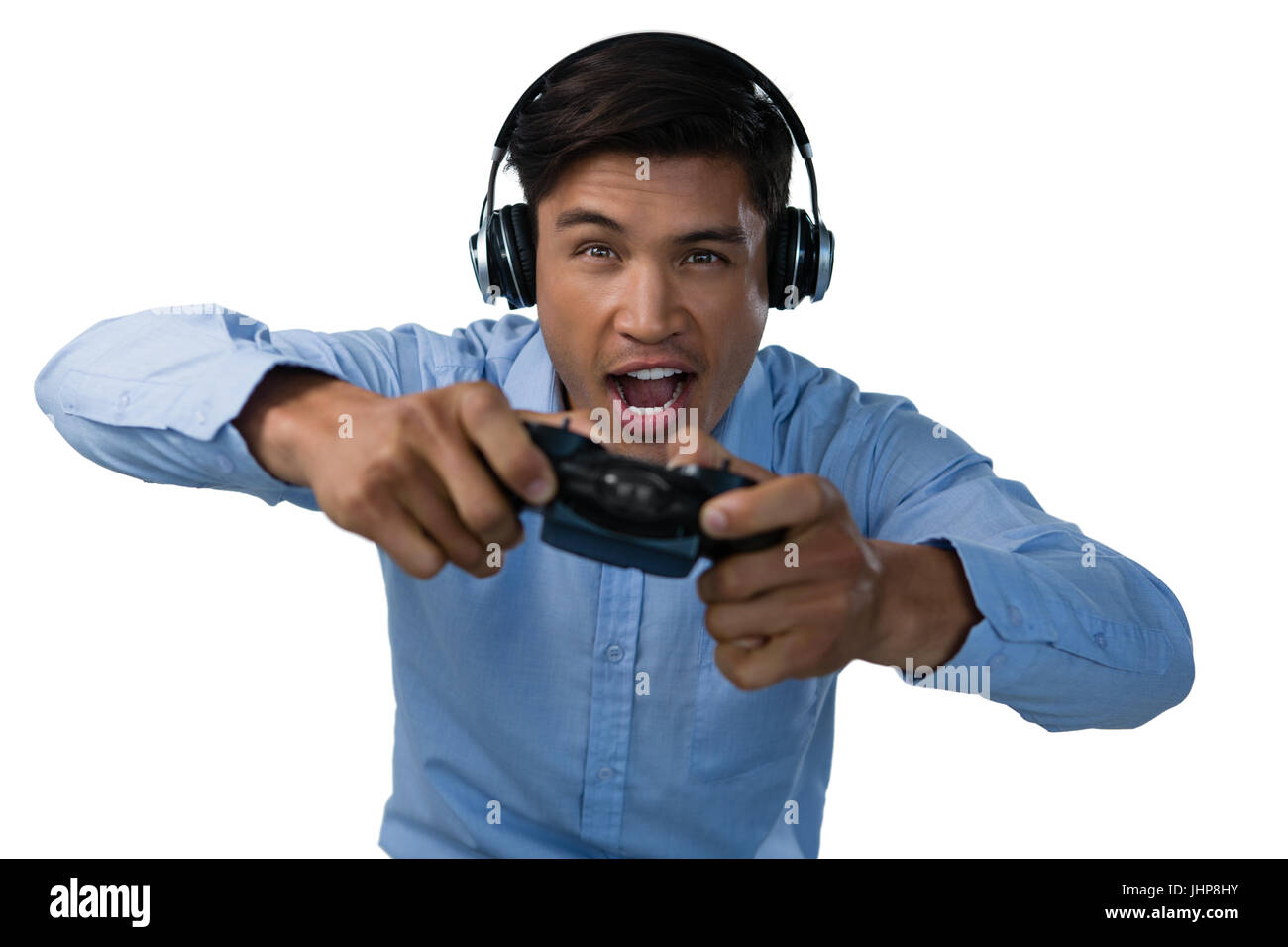 Businessman making face while playing video game against white ...