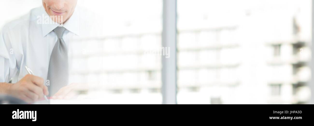 Digital composite of Man Signing Paper Agreement with buidings ...