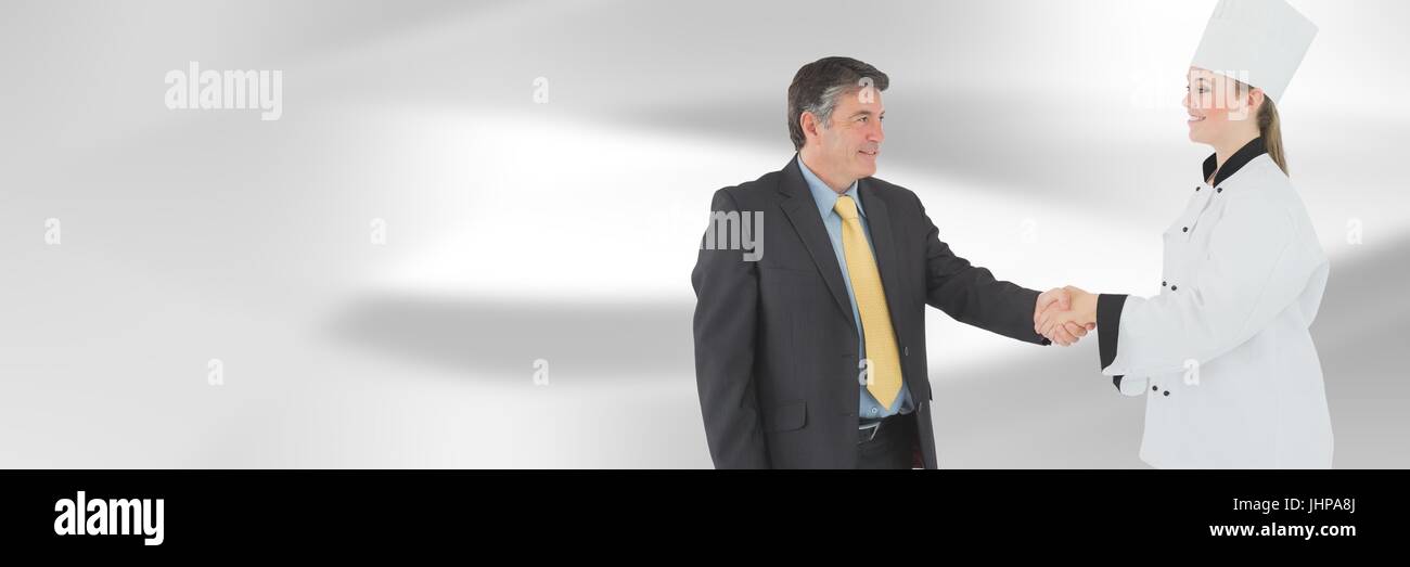 Digital composite of Chef and manager shaking hands with blurred ...