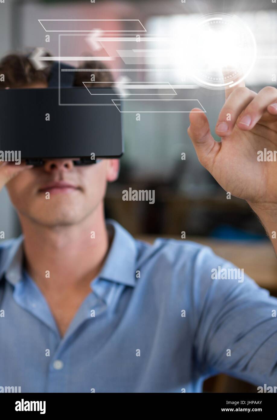 Digital composite of Man in VR headset touching interface Stock Photo ...