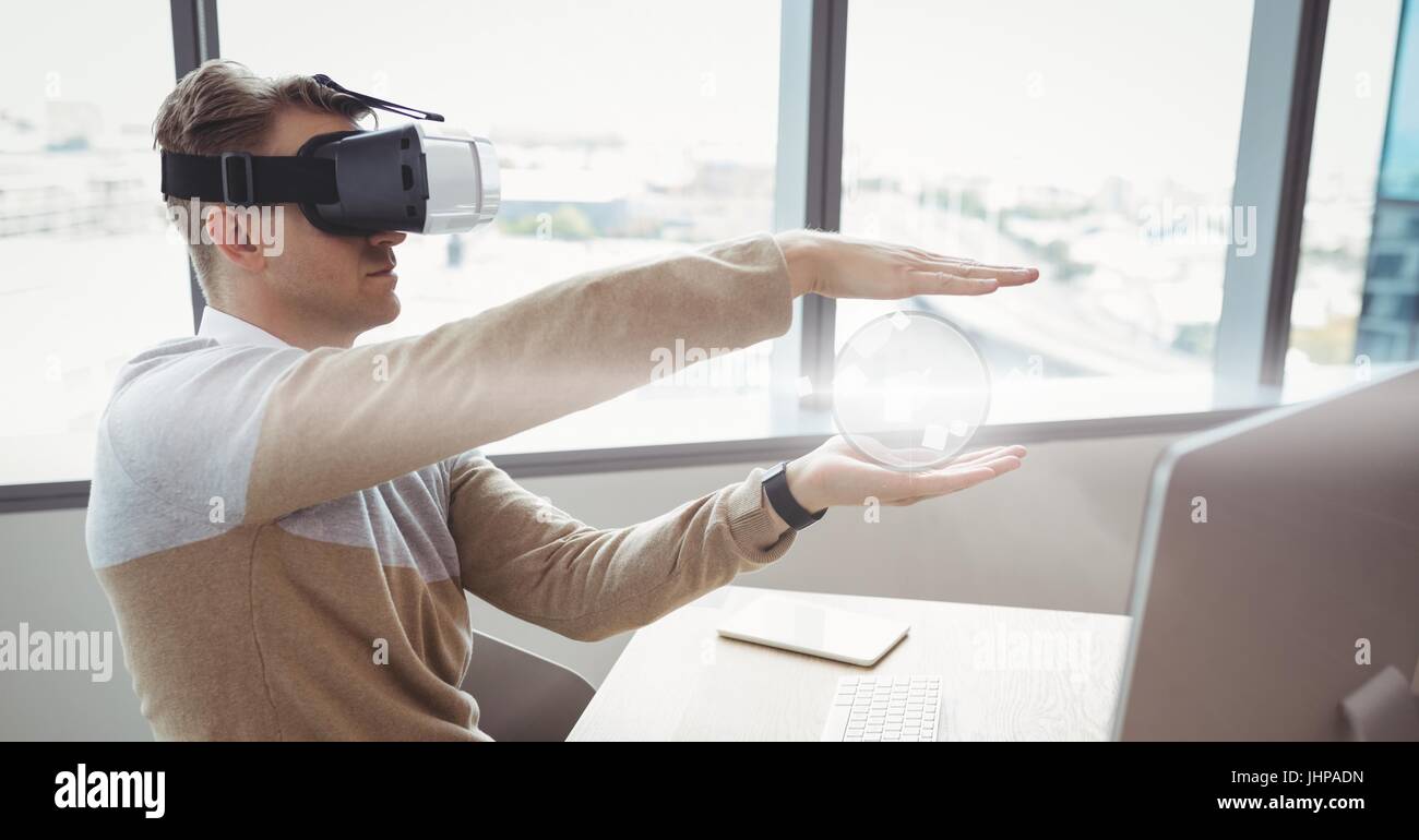 Digital composite of Man in VR headset touching interface with flares ...