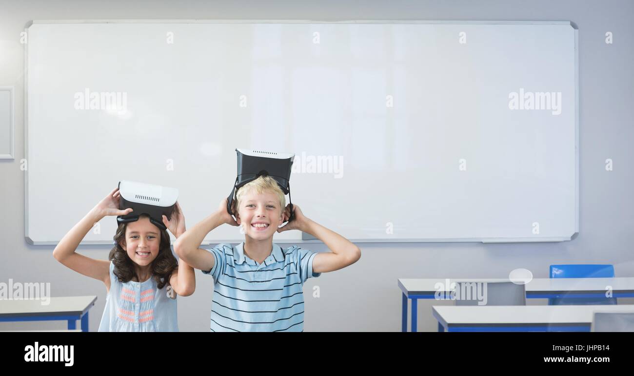 Digital composite of Kids with VR headsets smiling against classroom ...