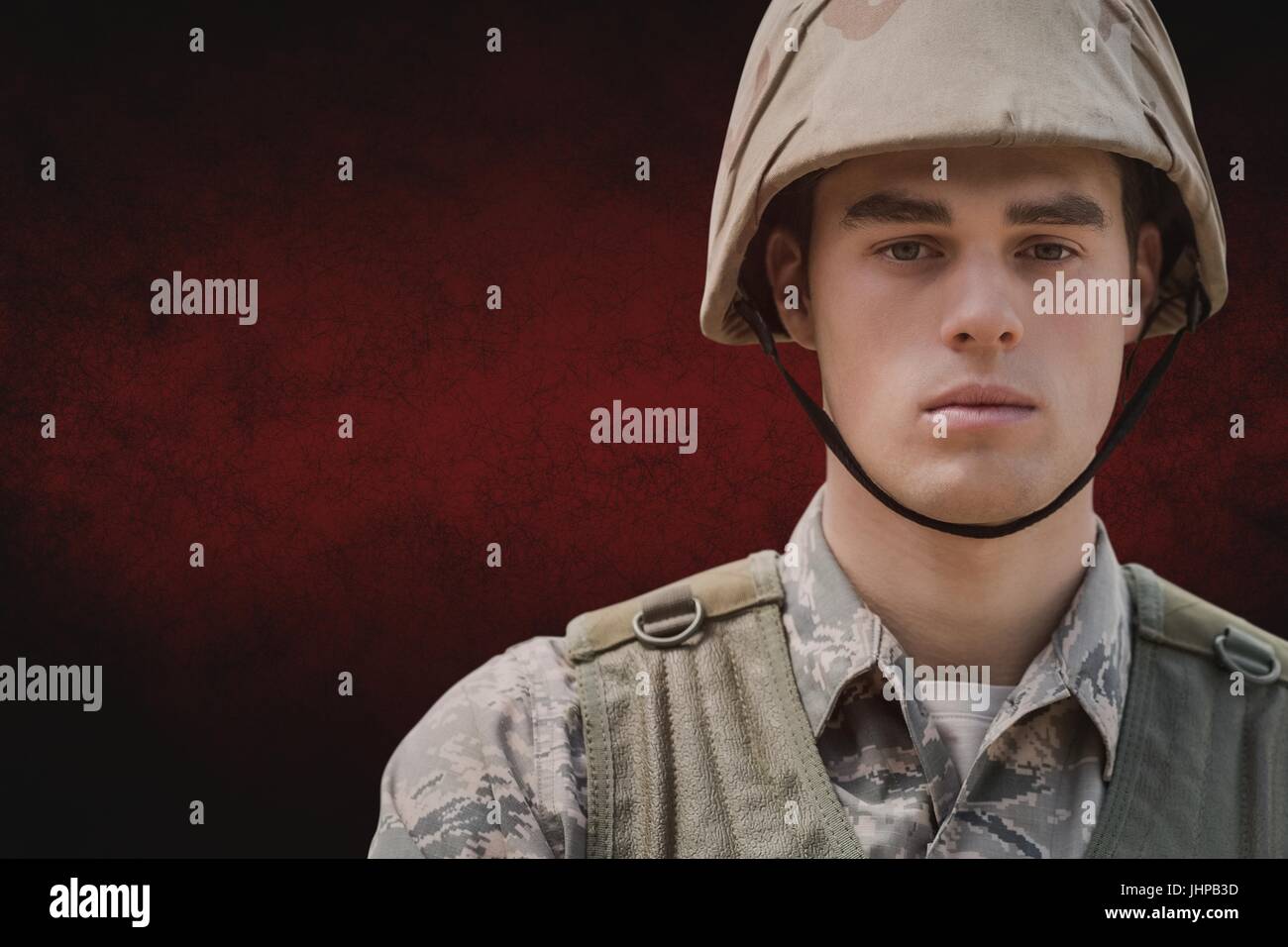 Digital composite of Soldier man standing against red background Stock ...