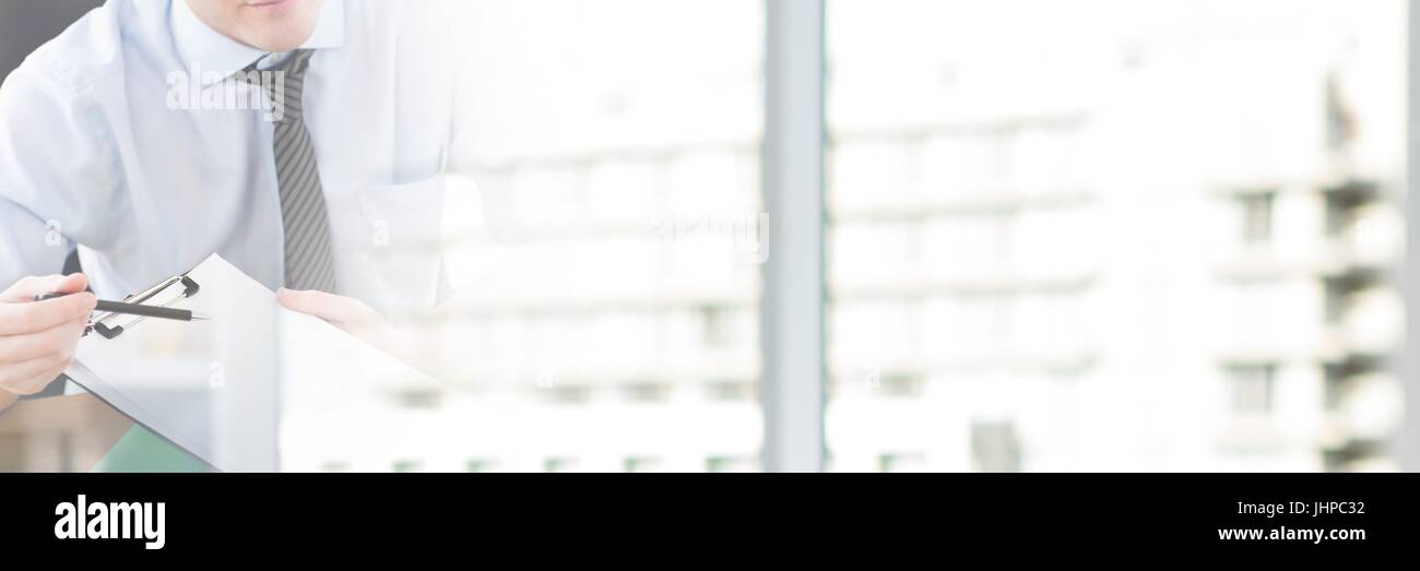 Digital composite of Man Signing Paper Agreement with buildings ...