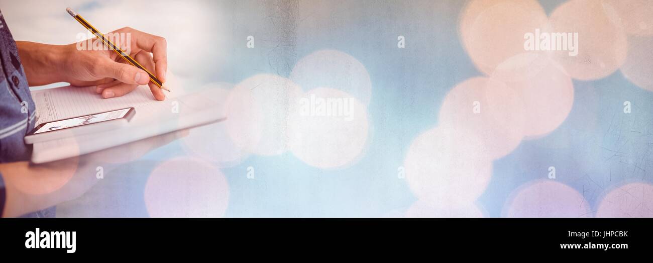 Digital composite of Hand Signing Paper Agreement with sparkling lights ...