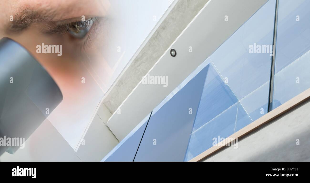 Digital composite of Close up of eye looking in microscope with window ...