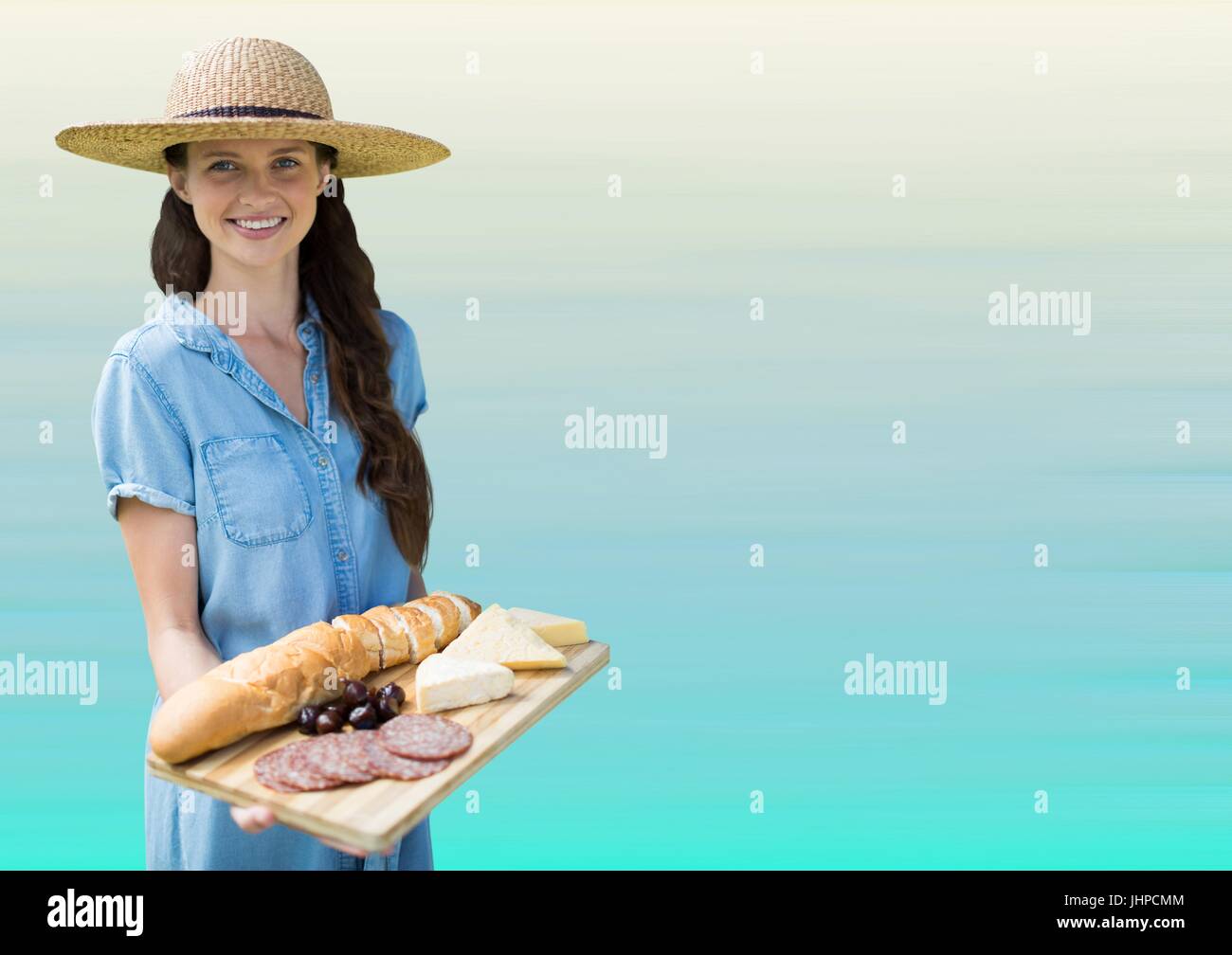 Digital composite of Woman with food platter against light blue ...